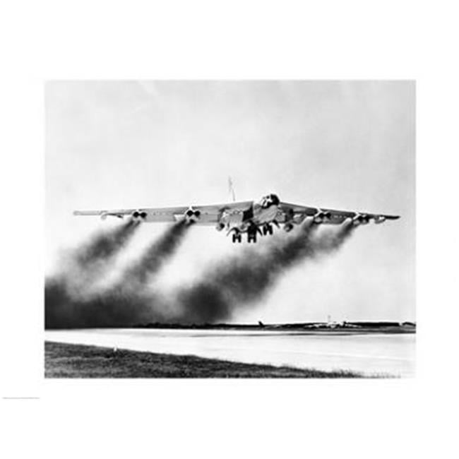PVT/Superstock Low angle view of a fighter plane taking off B-52 ...