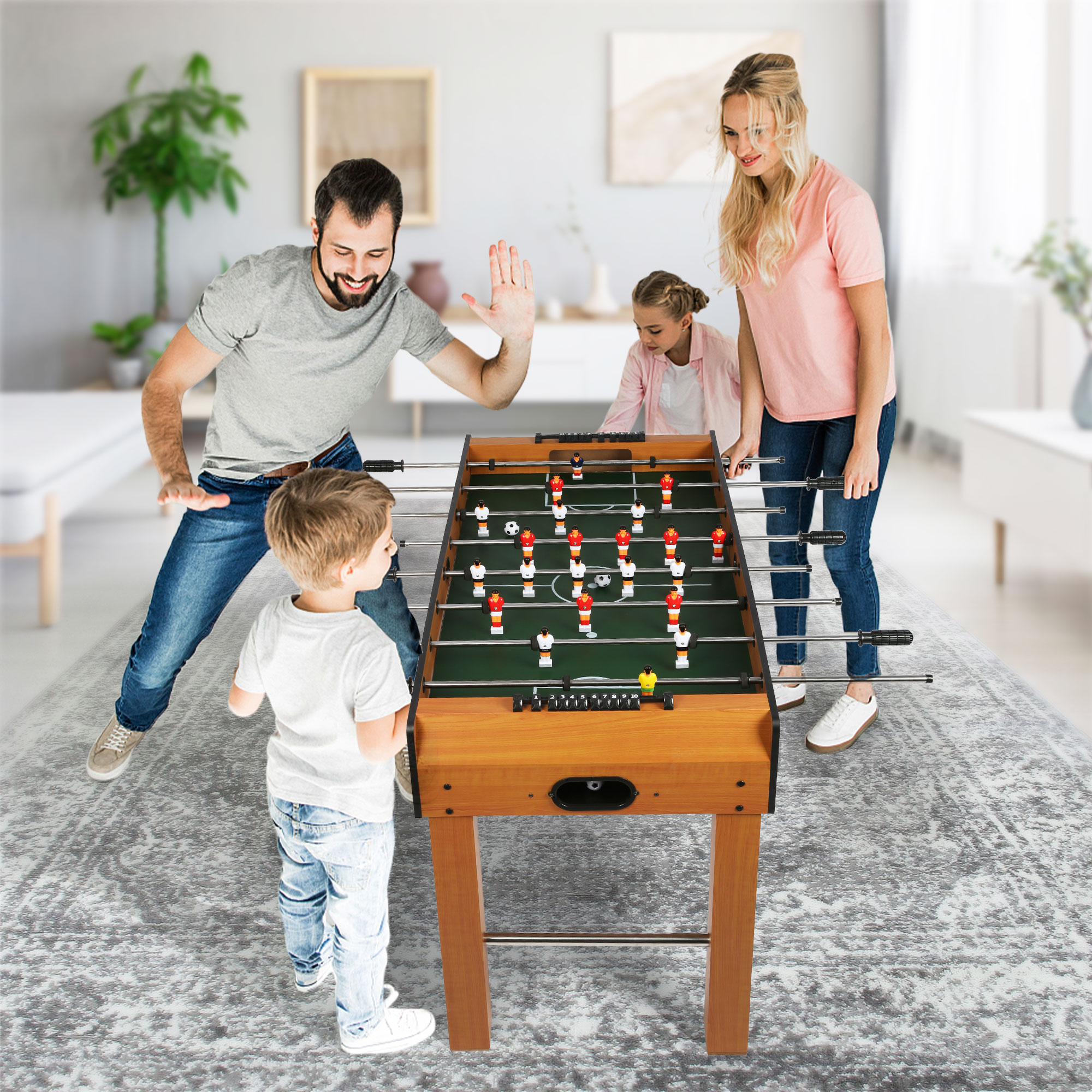 Family Playing Foosball