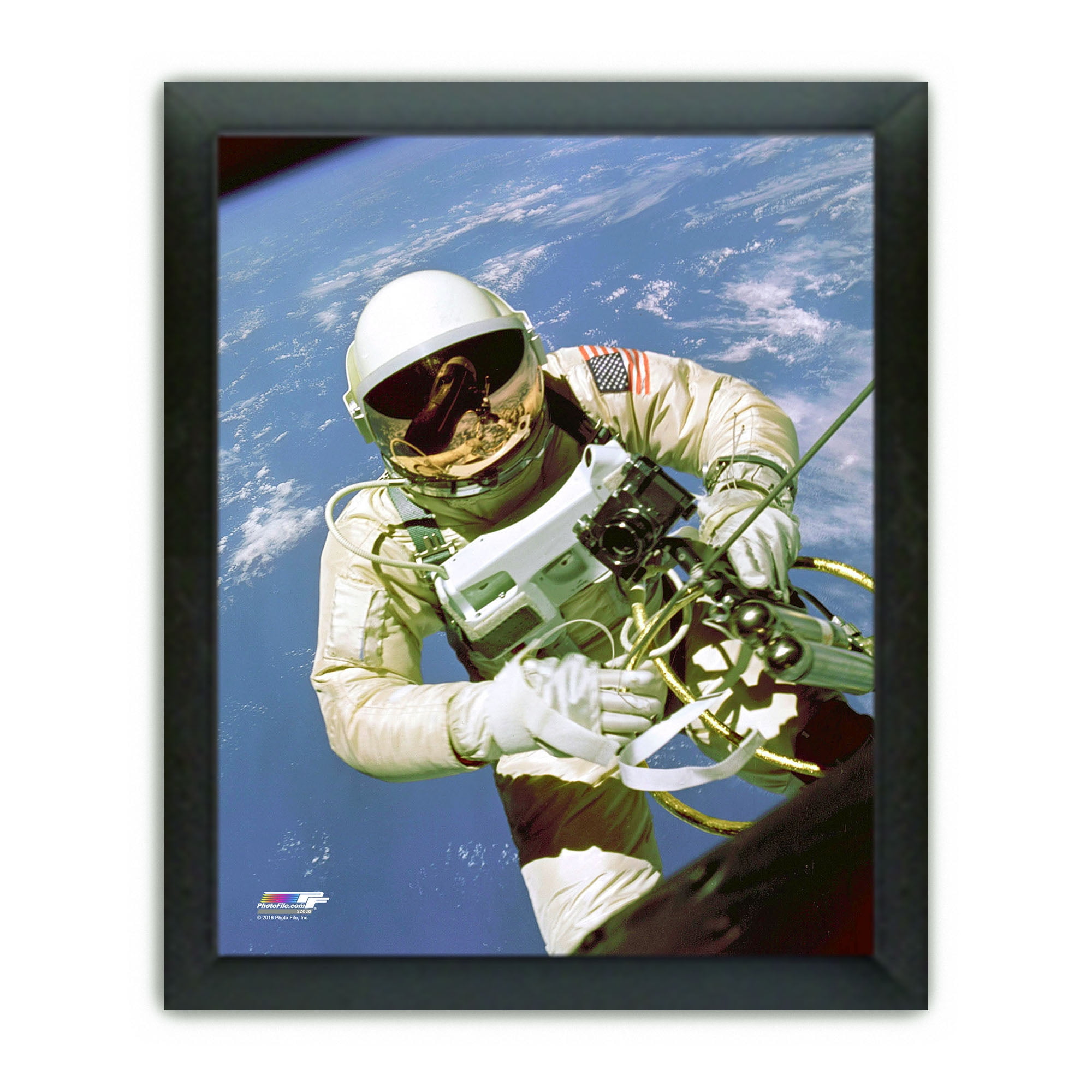 NASA Astronaut Ed White floats out of the hatch of his Gemini 4 capsule ...