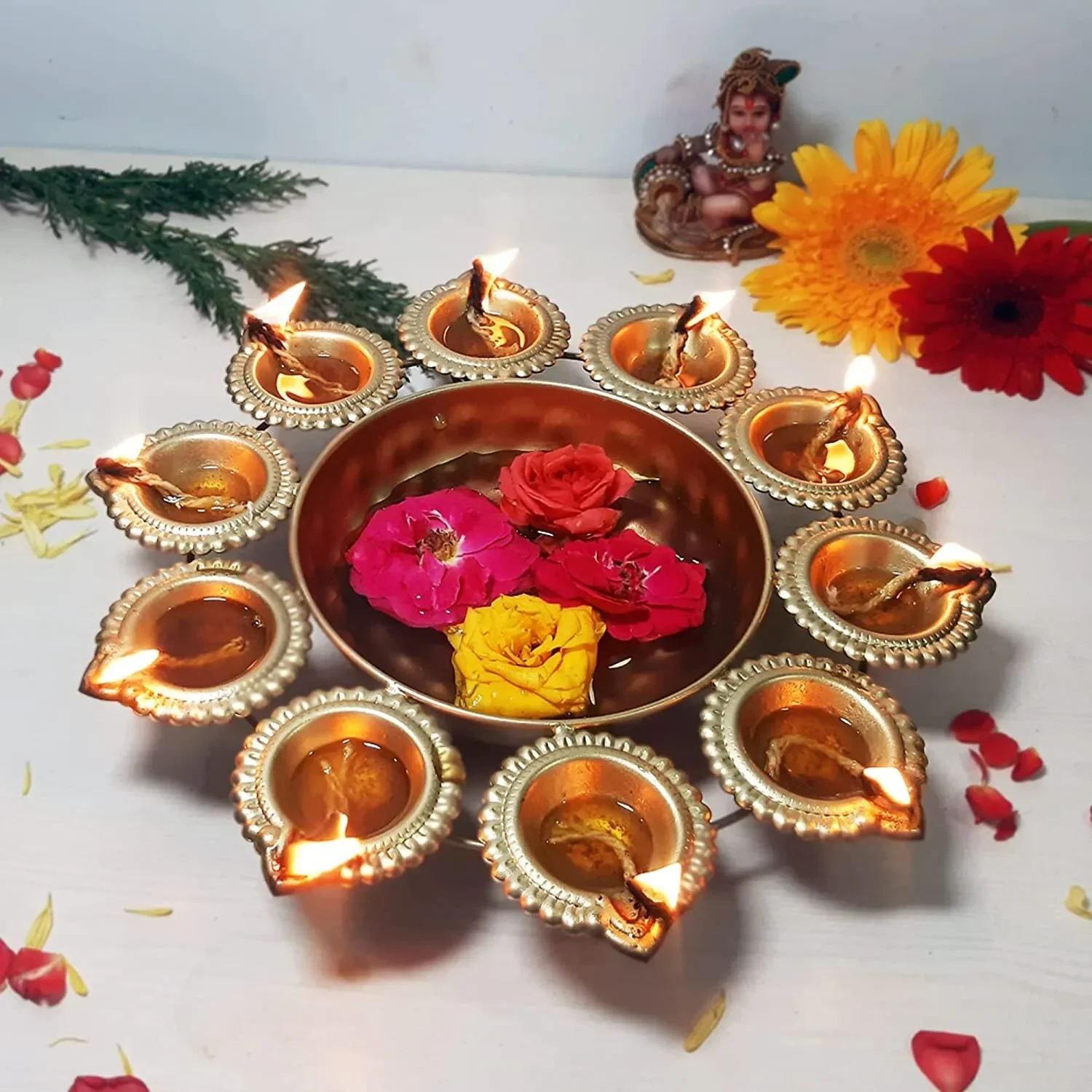 Click here for Osnica Diya Shape Flower Decorative Urli Bowl For... prices
