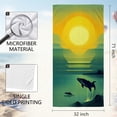 Boho towels A whale jumping out of the water in front of a sunset beach ...