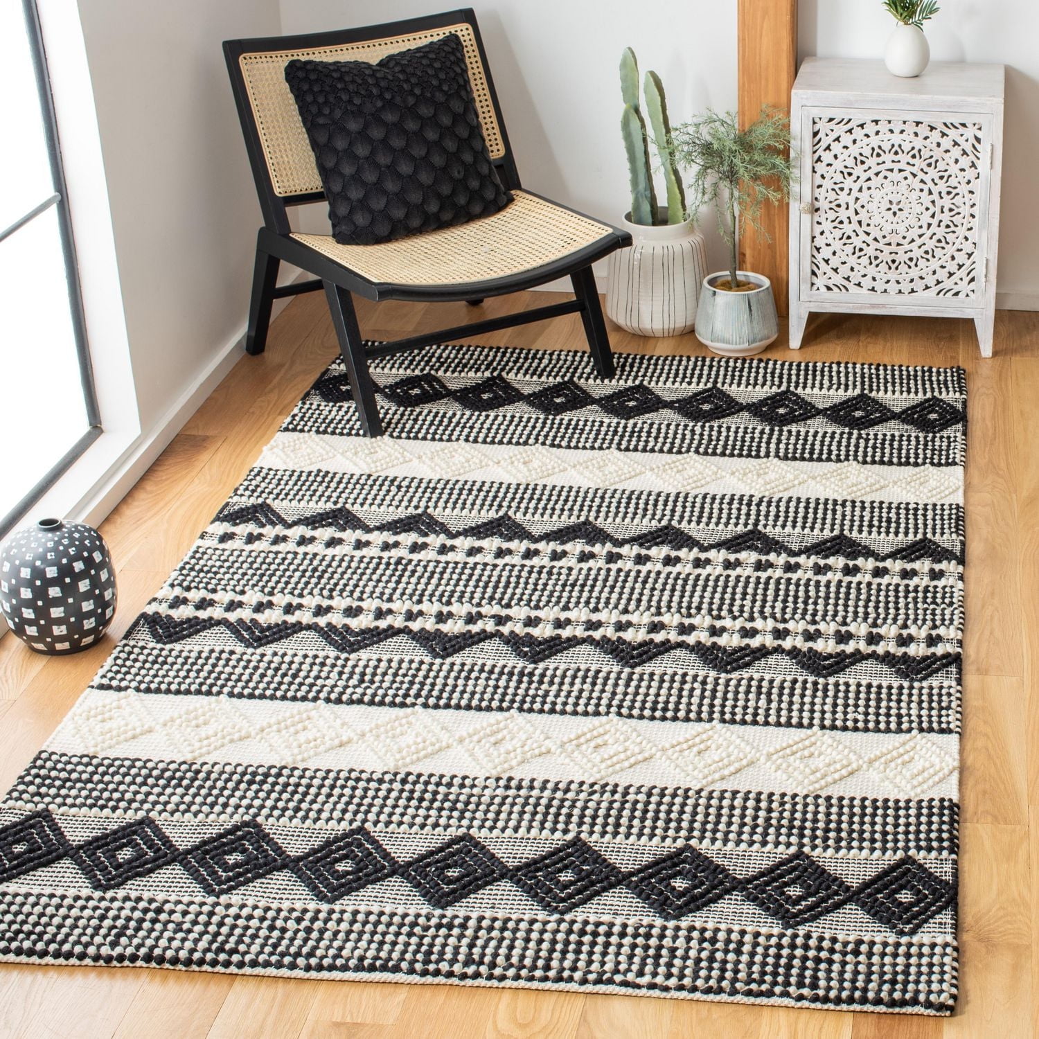 Click here for Safavieh Natura Carly Geometric Braided Wool Area... prices