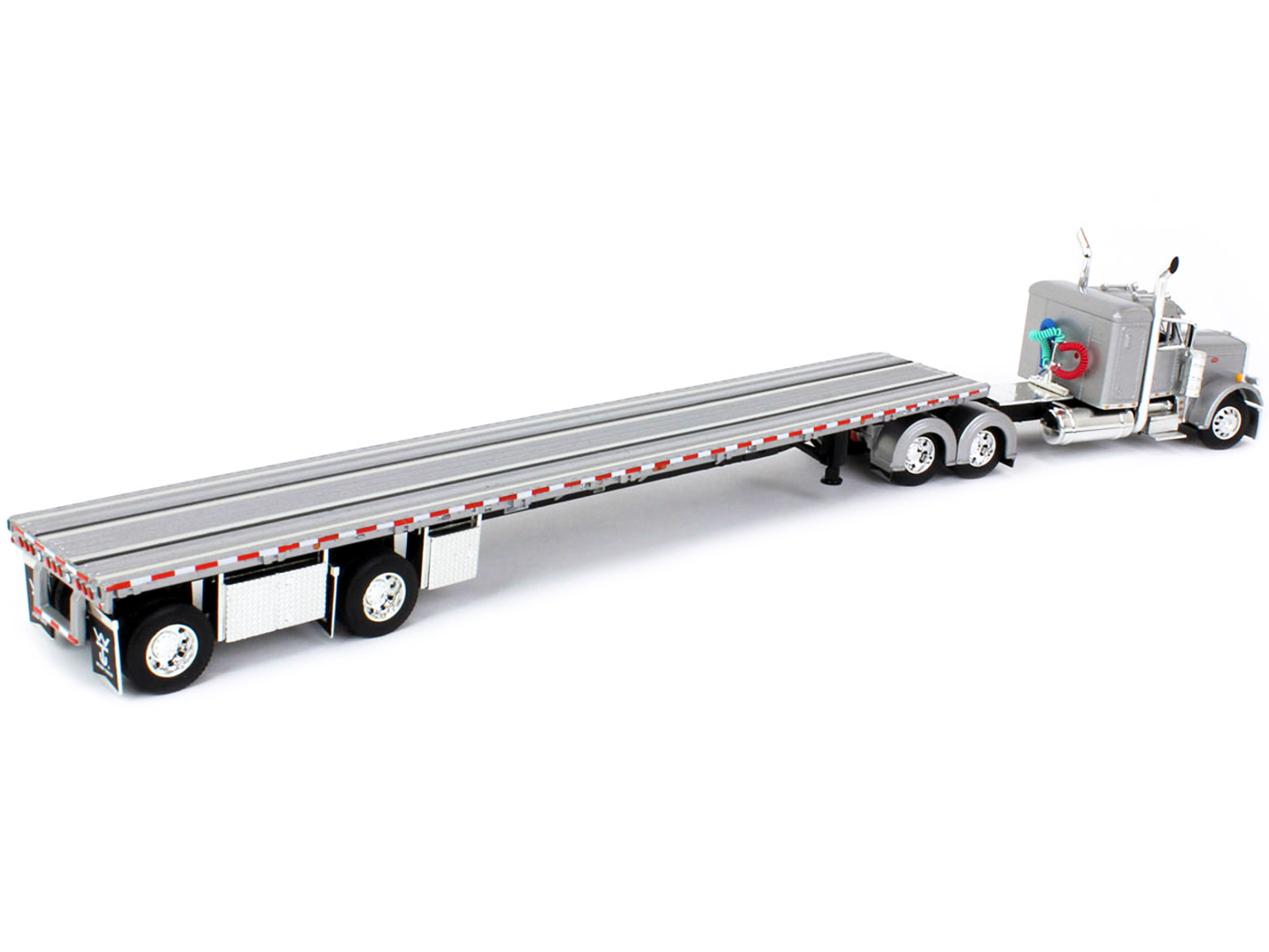 Peterbilt 359 with 36" Flat Top Sleeper and Wilson Roadbrute Spread-Axle Flatbed Trailer Silver ...