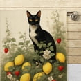 A black cat sitting in a field of flowers and lemonspaÃ±os de cocina4 ...