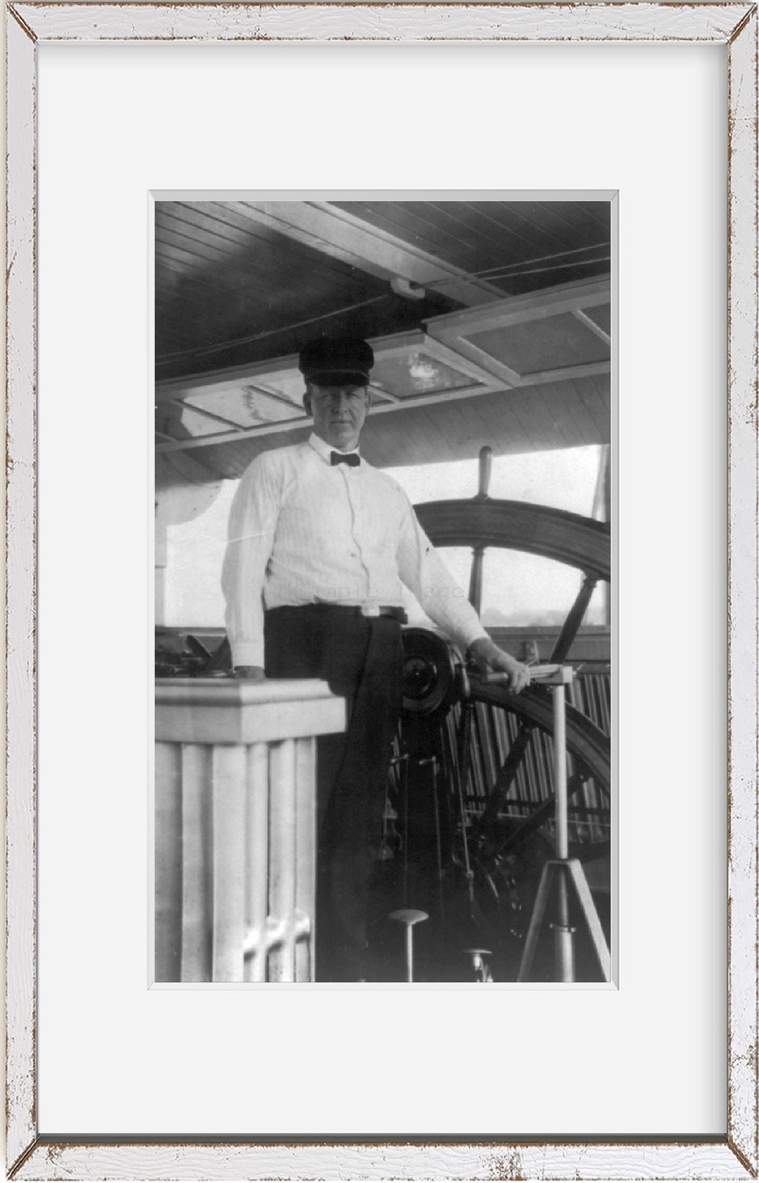 Photo: Captain James Brasher, L & C Packet Co. pilot, in pilot house of ...