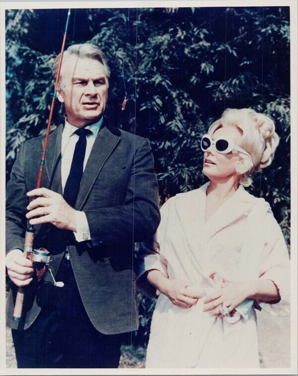 Green Acres TV series Eddie Albert holds fishing rod Eva Gabor in robe ...