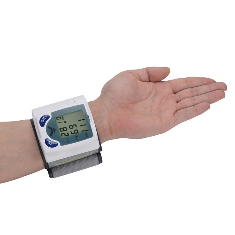 Automatic Wrist Sphygmomanometer Heart Beat Rate Pulse Meter Monitor ...