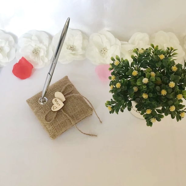 Pluma elegante con base para firmas de boda, ideal para eventos ...