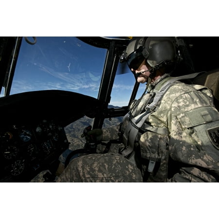 Co-pilot flying a CH-47 Chinook helicopter to Playas Training Area, New ...