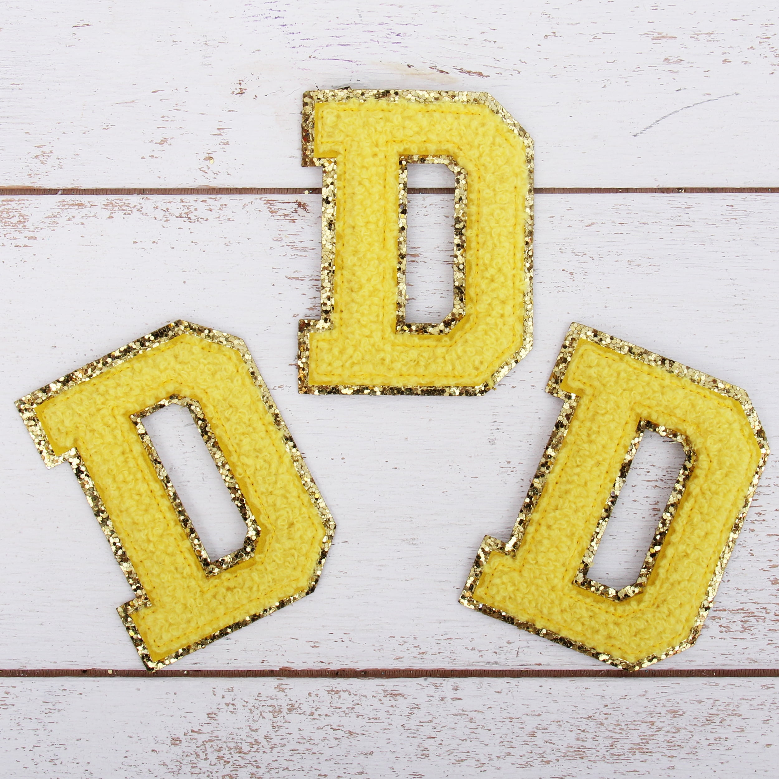 The Letter D In Gold Glitter