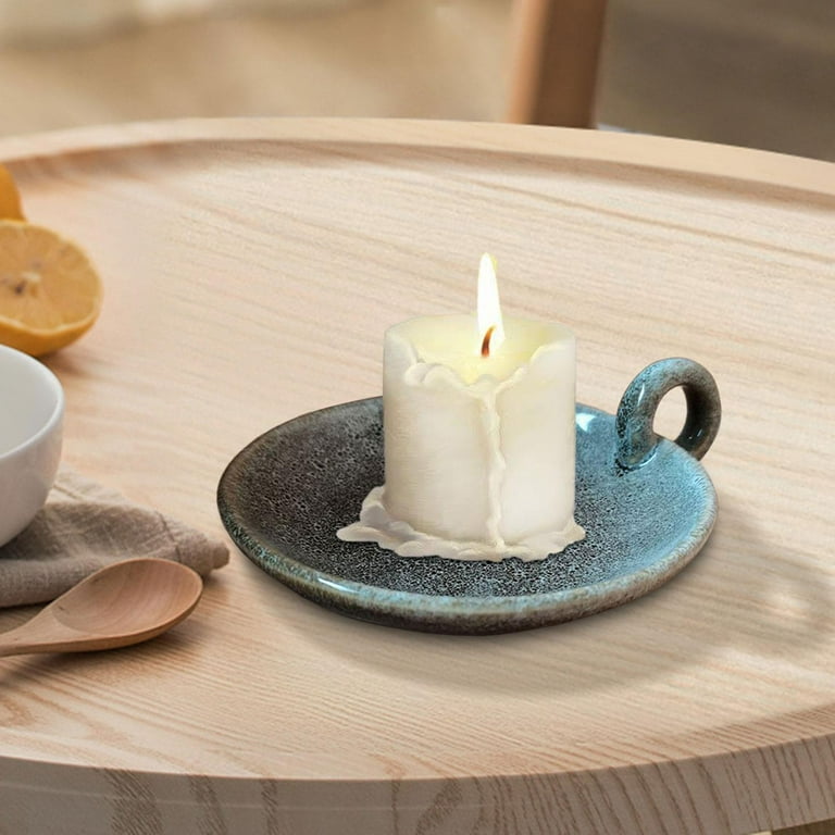 Candle on a plate store