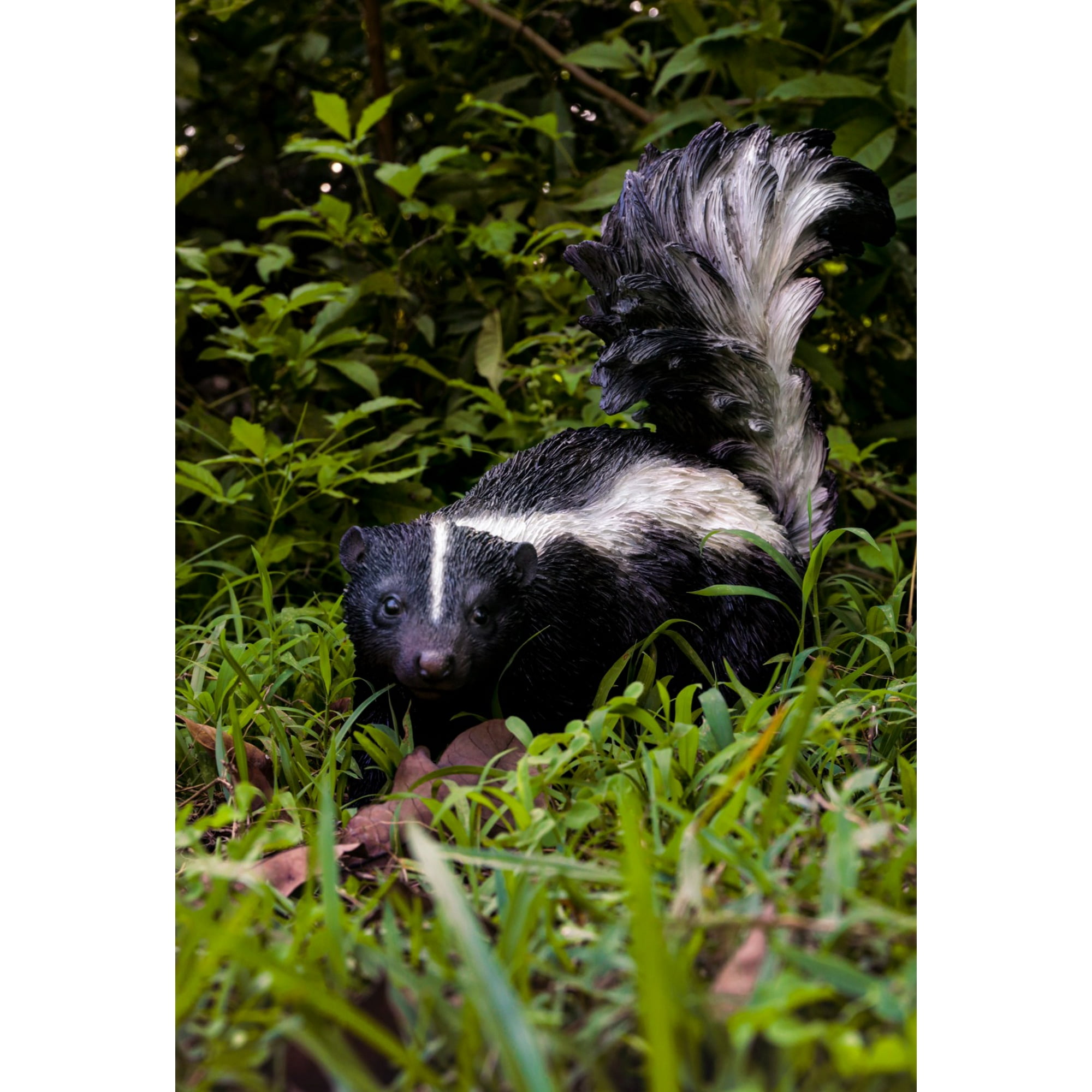 Click here for Hi-Line Gift Walking Skunk Statue prices