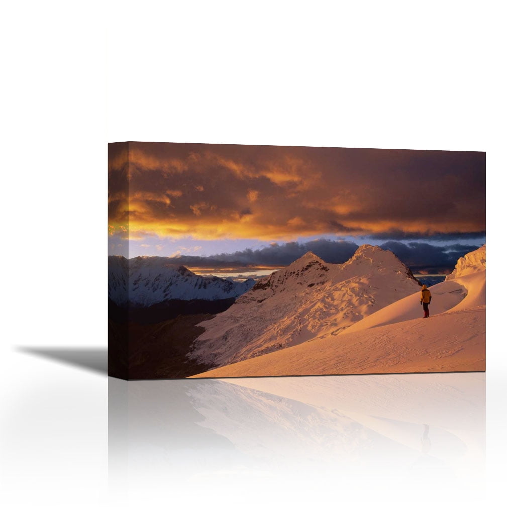 Hiker at sunset on Chinchey Massif, Cordillera Blanca, Peru ...