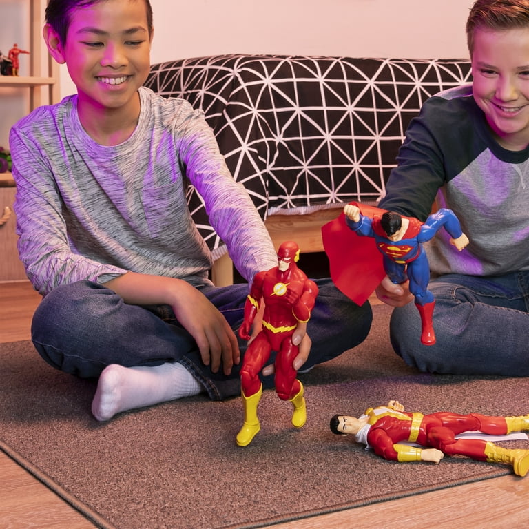 Kid Playing With Action Figures