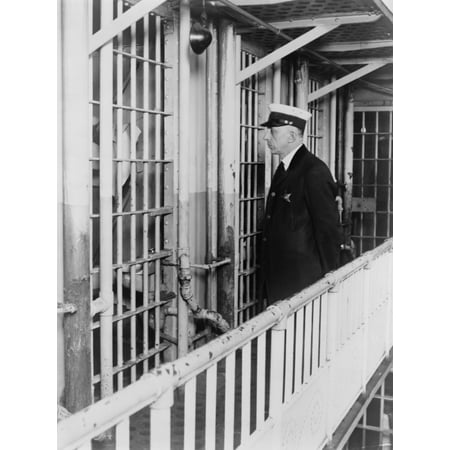 A Prison Guard At The Cook County Jail Standing Outside The Cell Of ...