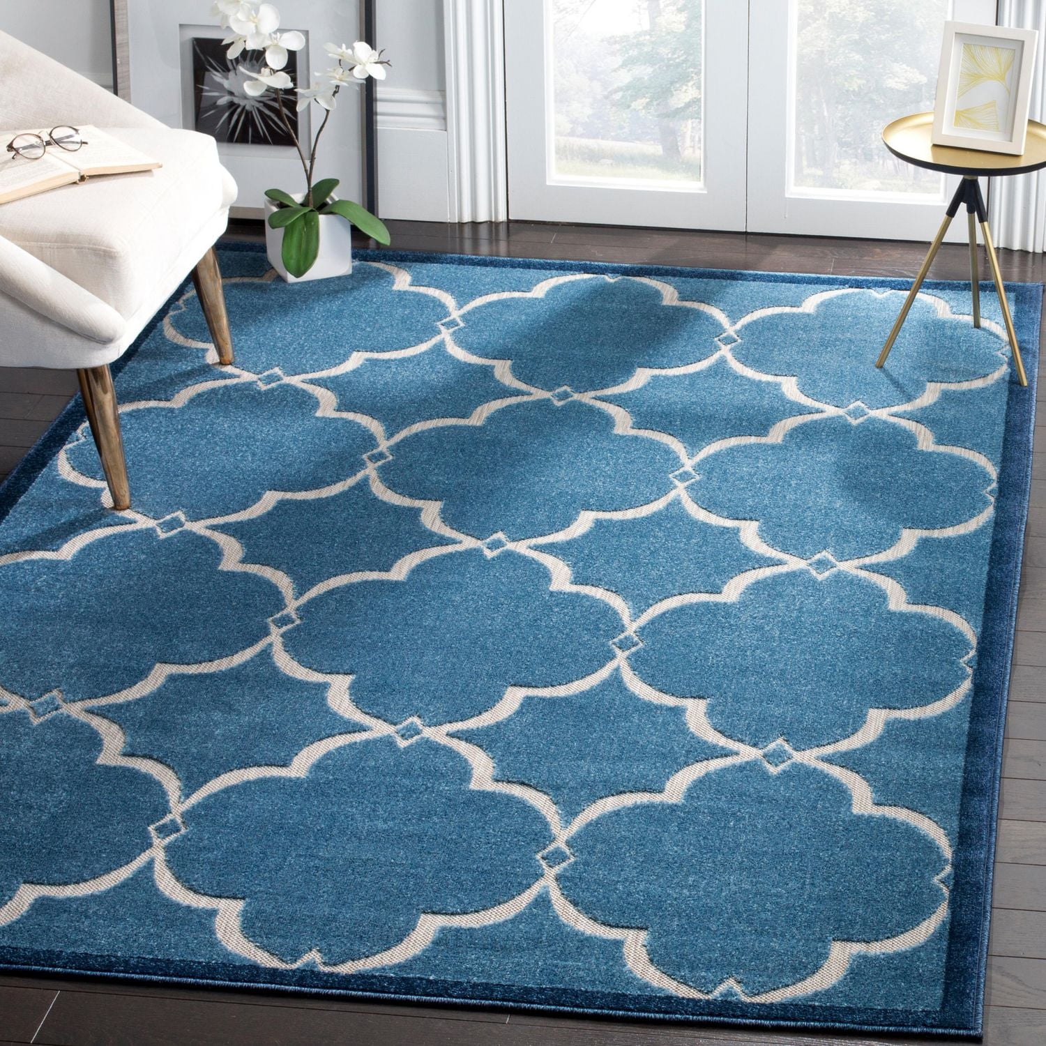 Click here for Safavieh Cottage Ezekiel Geometric Trellis Outdoor... prices