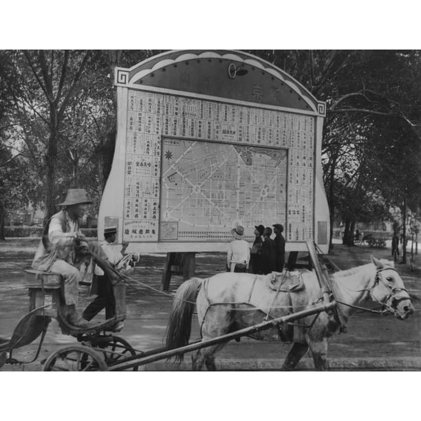 Horse Drawn Wagon Passes Billboard With Japanese Plan For New City Of ...