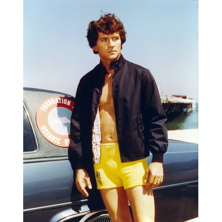 Patrick Duffy standing in Swimming Trunks with Black Jacket Photo Print ...
