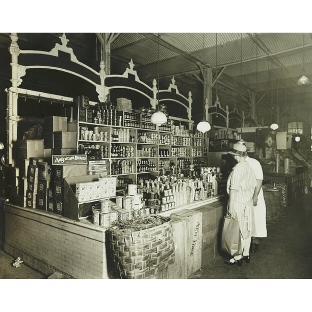Woman Shopping For Canned Goods At Grocery Store In The 1920S. The Old ...