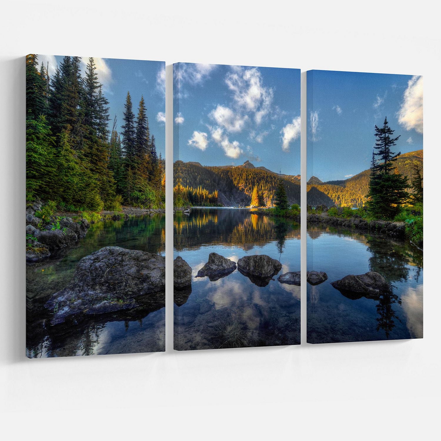 Click here for Designart Mountain Lake Surrounded By Trees Canvas... prices