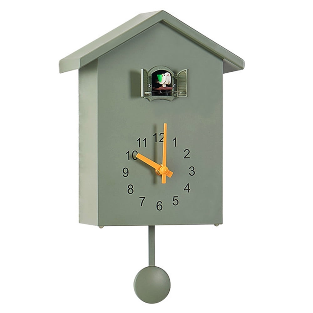 Nordic style wall clock cuckoo bird goes out of the window to tell the ...