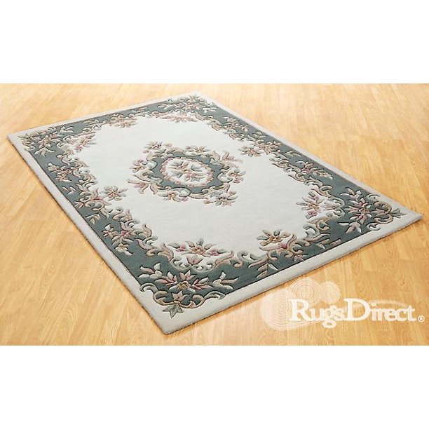 Royal Indian Cream-Green The design is in shades of green, beige and ...