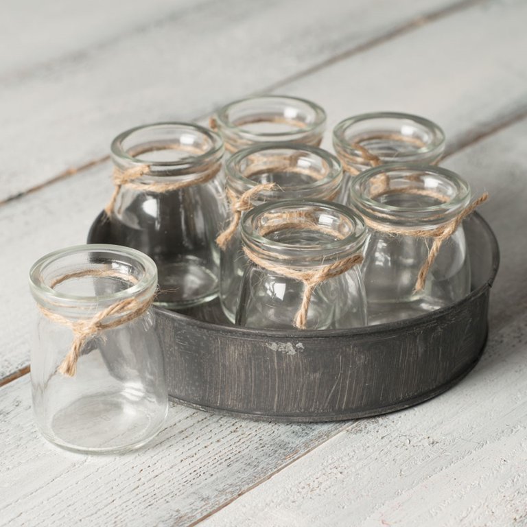 Clear Bottle With Glass Votive Centerpiece
