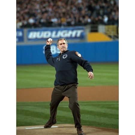President George W. Bush Throws The Ceremonial First Pitch At Yankee ...