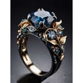 Blue Synthetic Zirconia Ring With Silvertone Band And Goldtone Vine ...