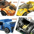 Four models of small particle building block racing cars are given as ...
