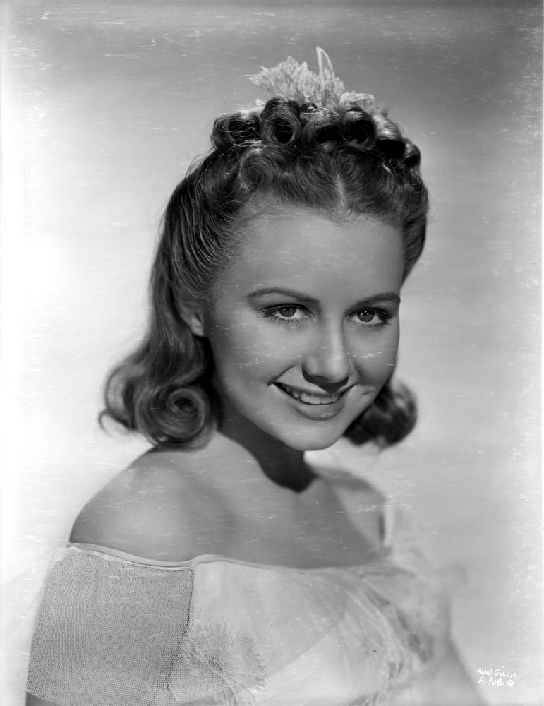 Ann Gillis smiling and wearing an Off-Shoulder Top Portrait Photo Print ...