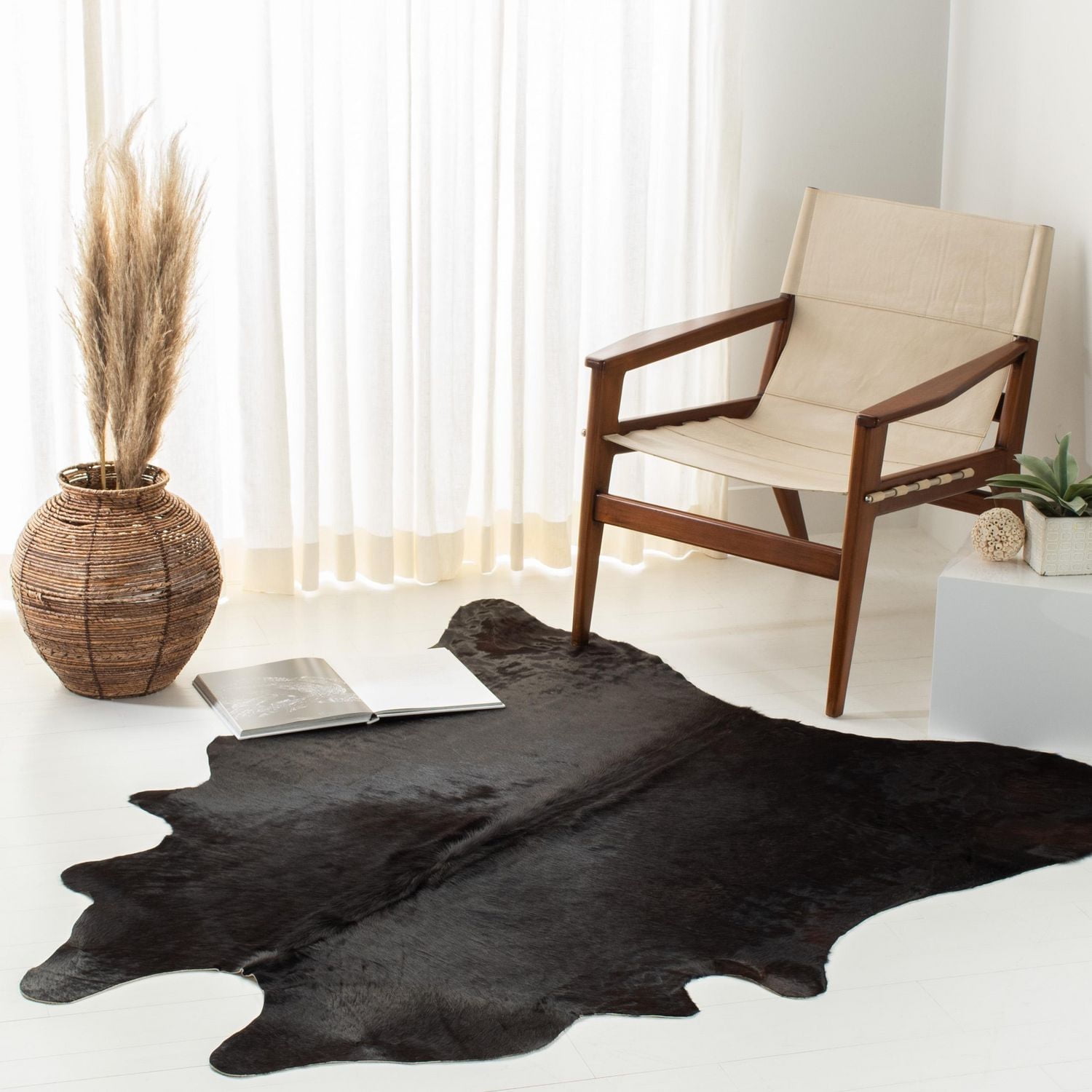 Click here for Safavieh Cow Hide Donovan Animal Area Rug 4 Ft. X... prices