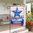 garden flags patriotic A welcome sign with a blue star on top of an ...