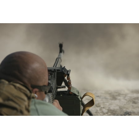 U.S. Contractor firing the automatic PKM 7.62 machine gun on the firing ...
