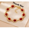 3PC Pierced gold and red stone necklace, bracelet, and earring set ...