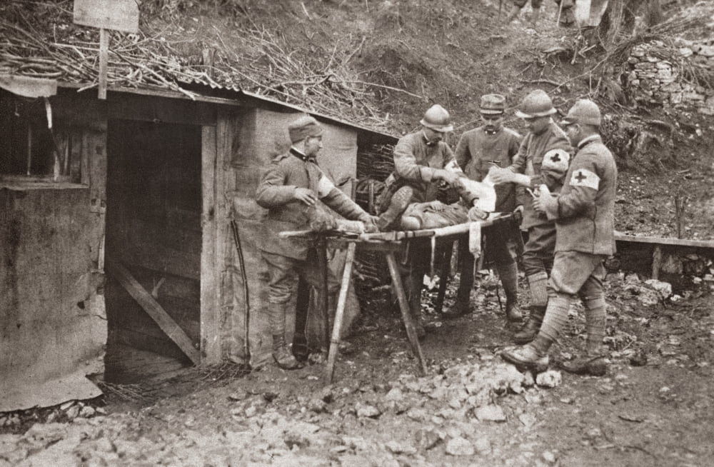 Wwi: Dressing Station. /Na Wounded Italian Soldier Being Treated By ...
