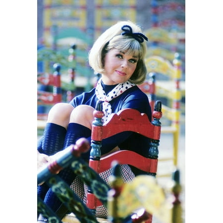 Doris Day high heel boots seated on chair 24x36 Poster - Walmart.com