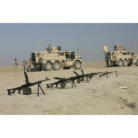 PK 7.62 mm general-purpose machine guns and RPK Kalashnikov rifles sit ...