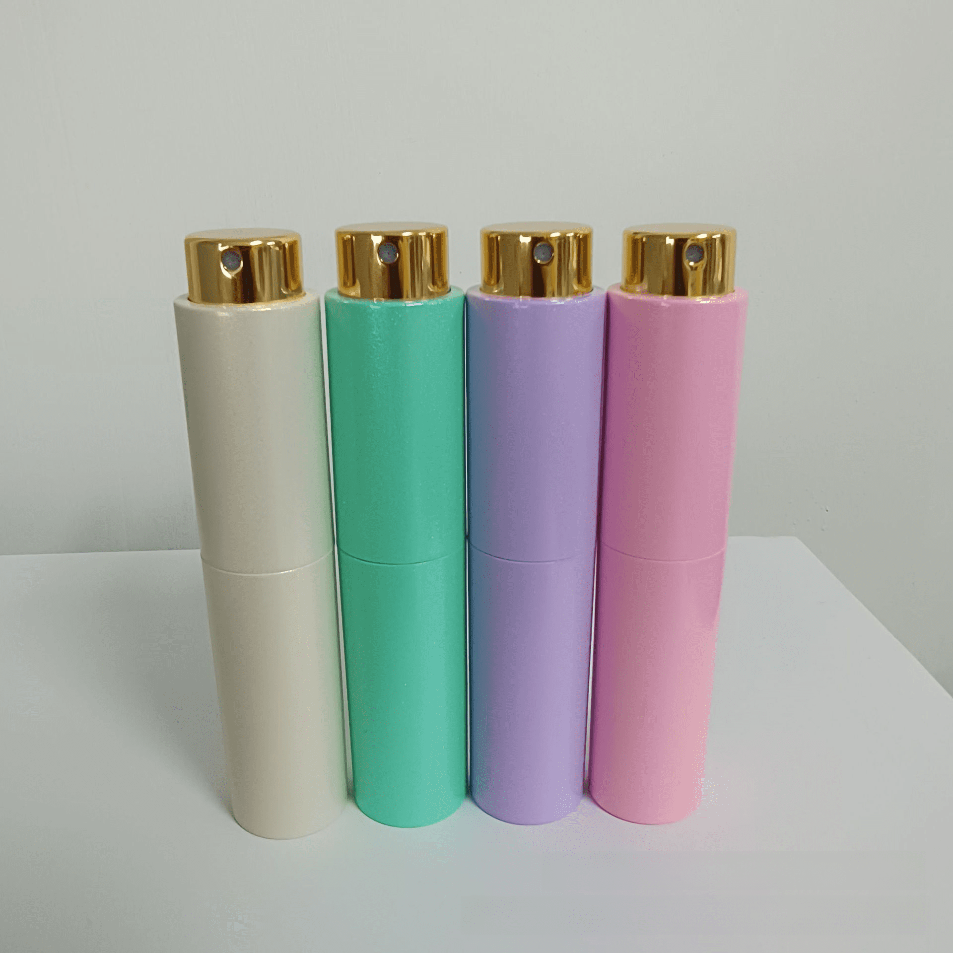 Botella rociadora de perfume giratoria telescópica con subsuperficie ...