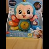 VTech Snug-a-Bug Musical Critter Infant Toy With Light-Up Tummy ...