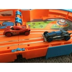 Hot Wheels Slot Track Pack with Carrying Case, Two 1:64 Cars, and 5.5 ...