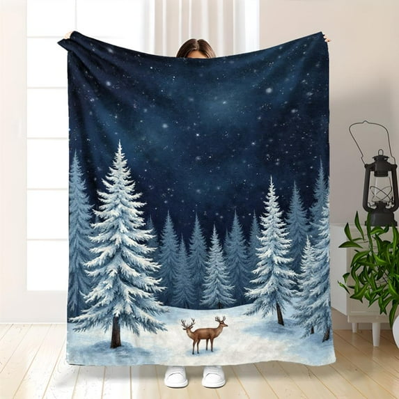 1 warm and comfortable flannel blanket with a winter forest design ...