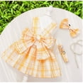 2 sets of bright yellow plaid skirts, harnesses, leashes, vests and ...
