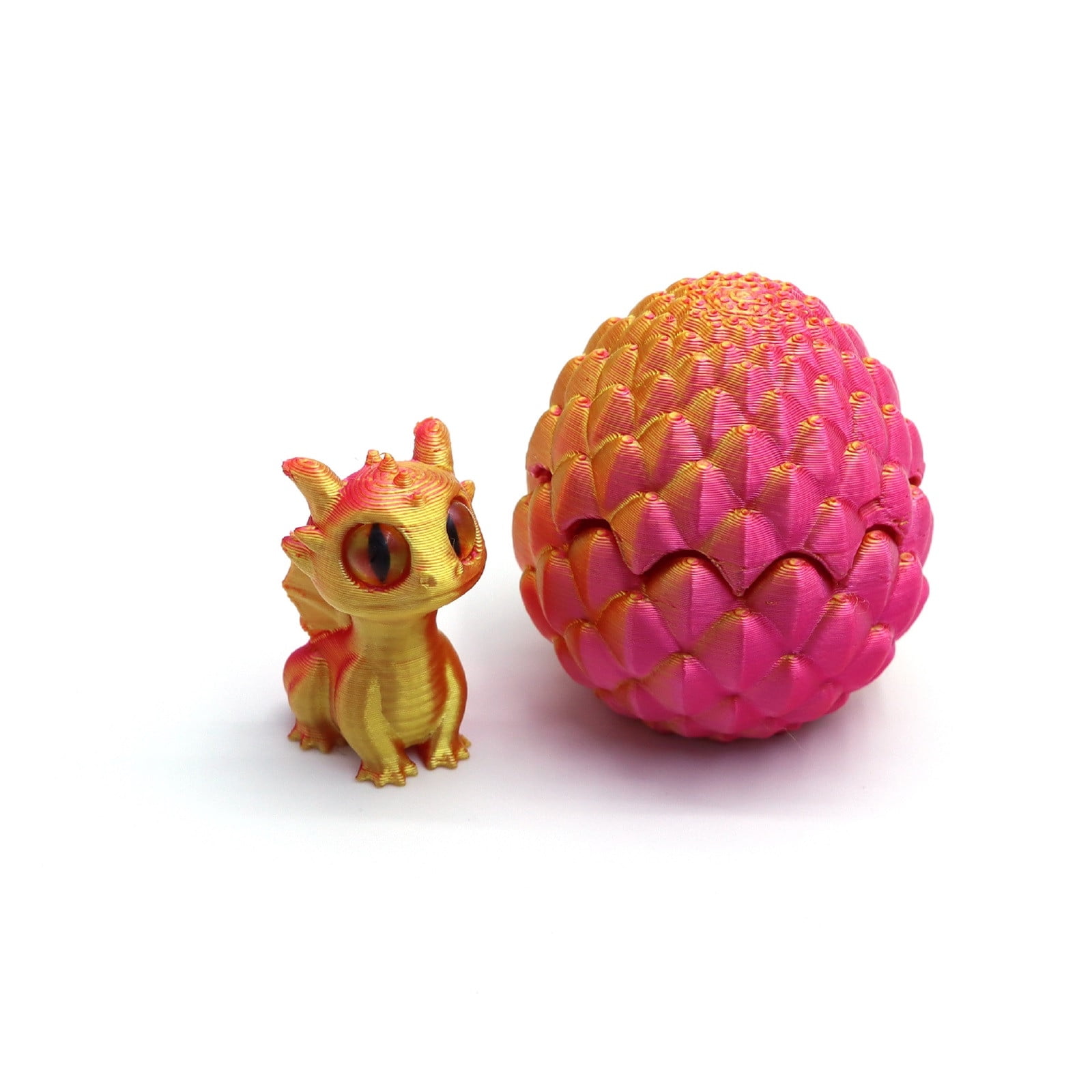 3D Printed Dragon Egg Toys with Articulated Dragons Inside Vermilion ...