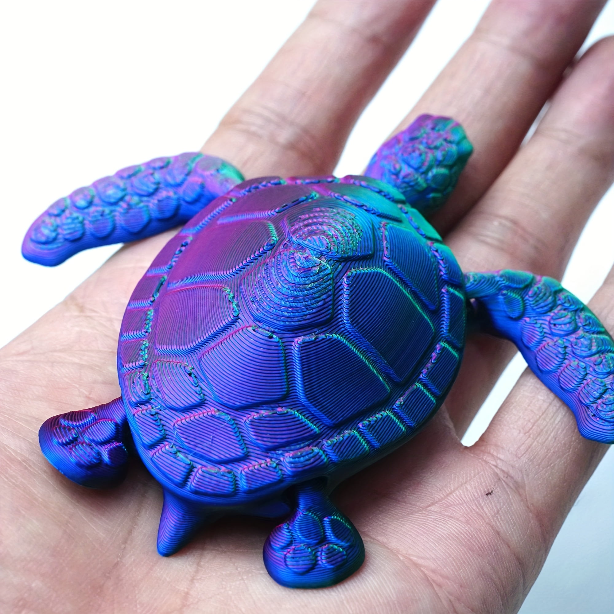 3D printed turtles with full body joints that can move freely and can ...