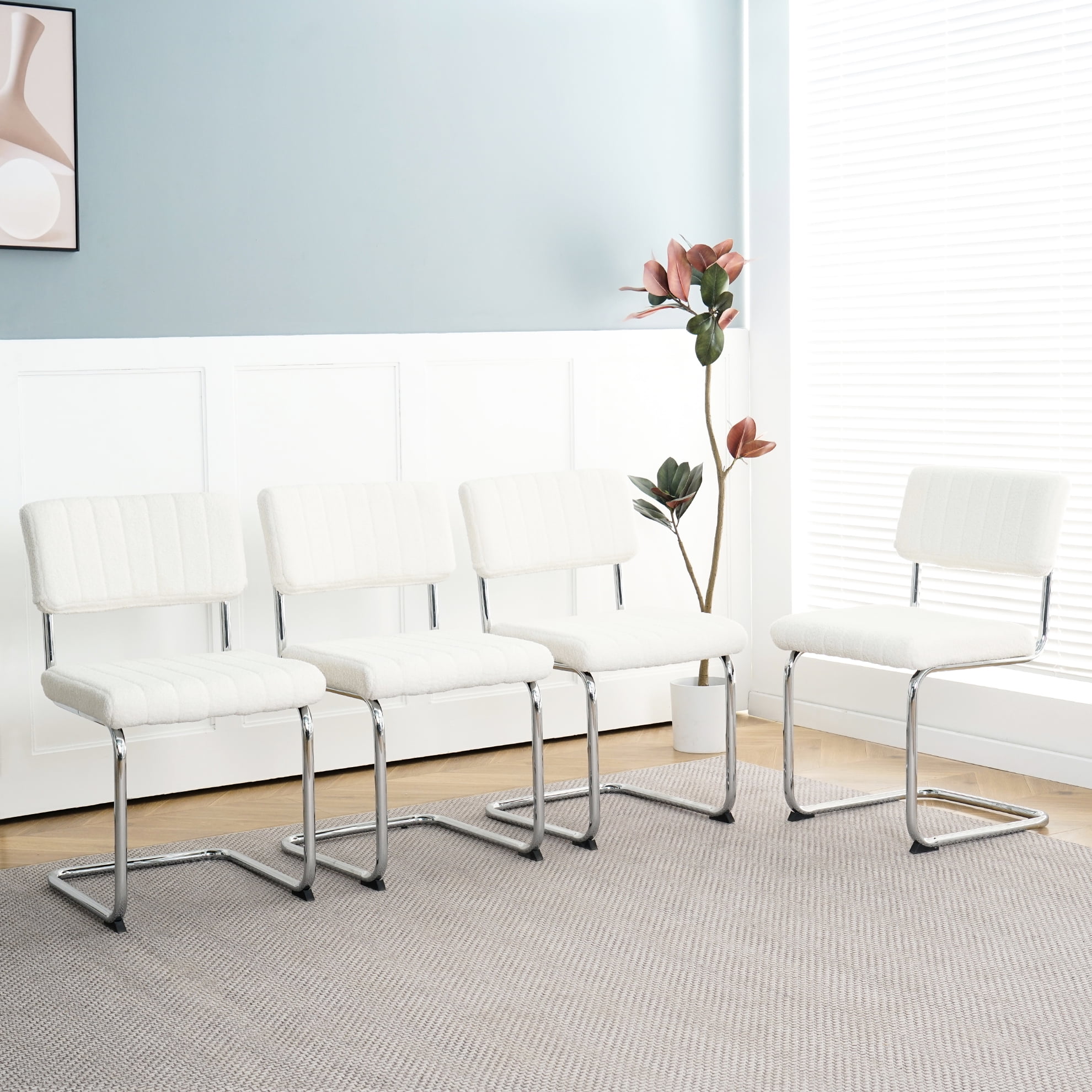 4 Luxury White Chairs. Metal Legs (silver), Stable Base. Slip ...