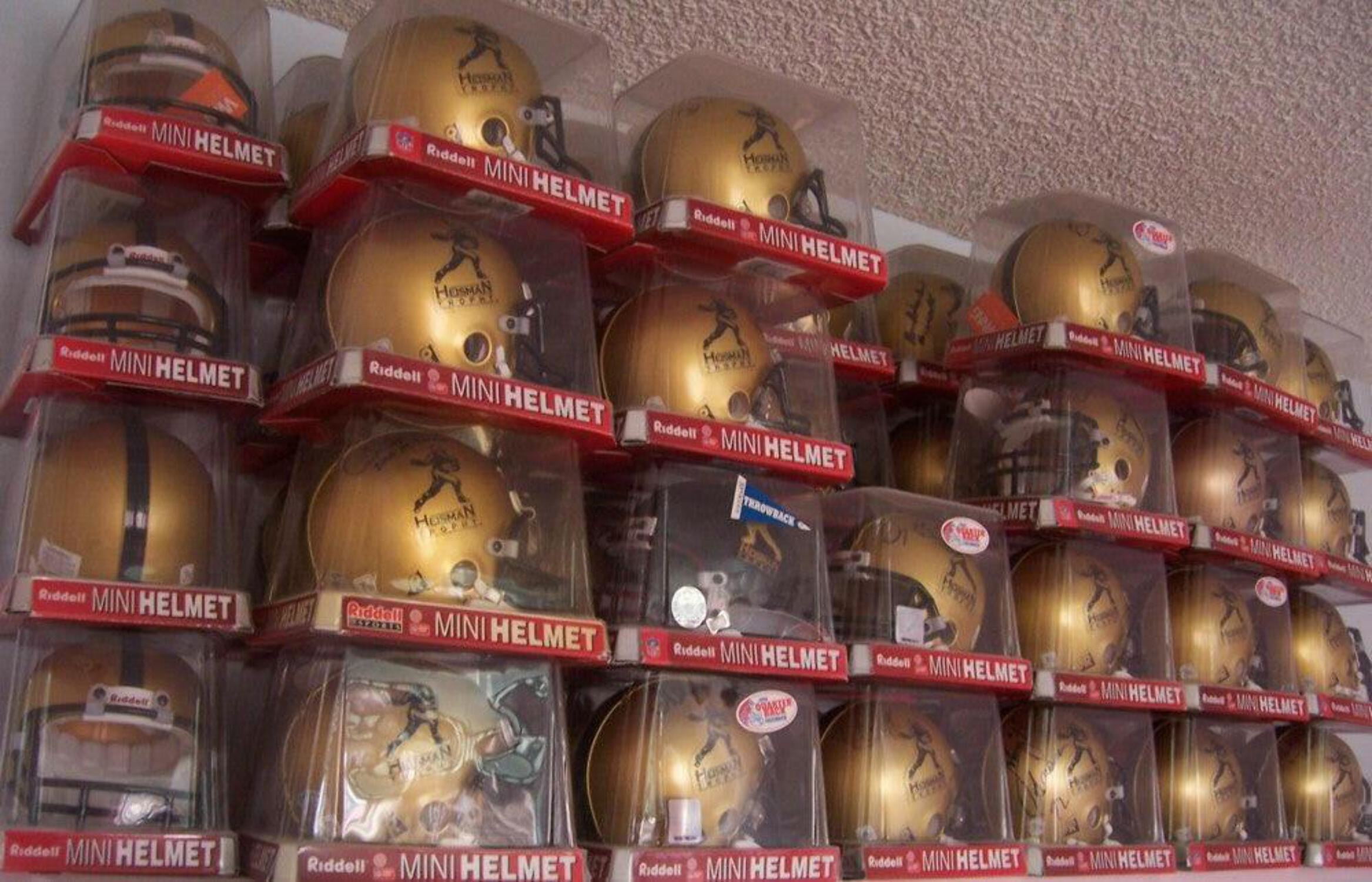49 autographed Heisman mini helmets Jay Berwanger Tony Dorsett Barry Sanders Roger Staubach ...