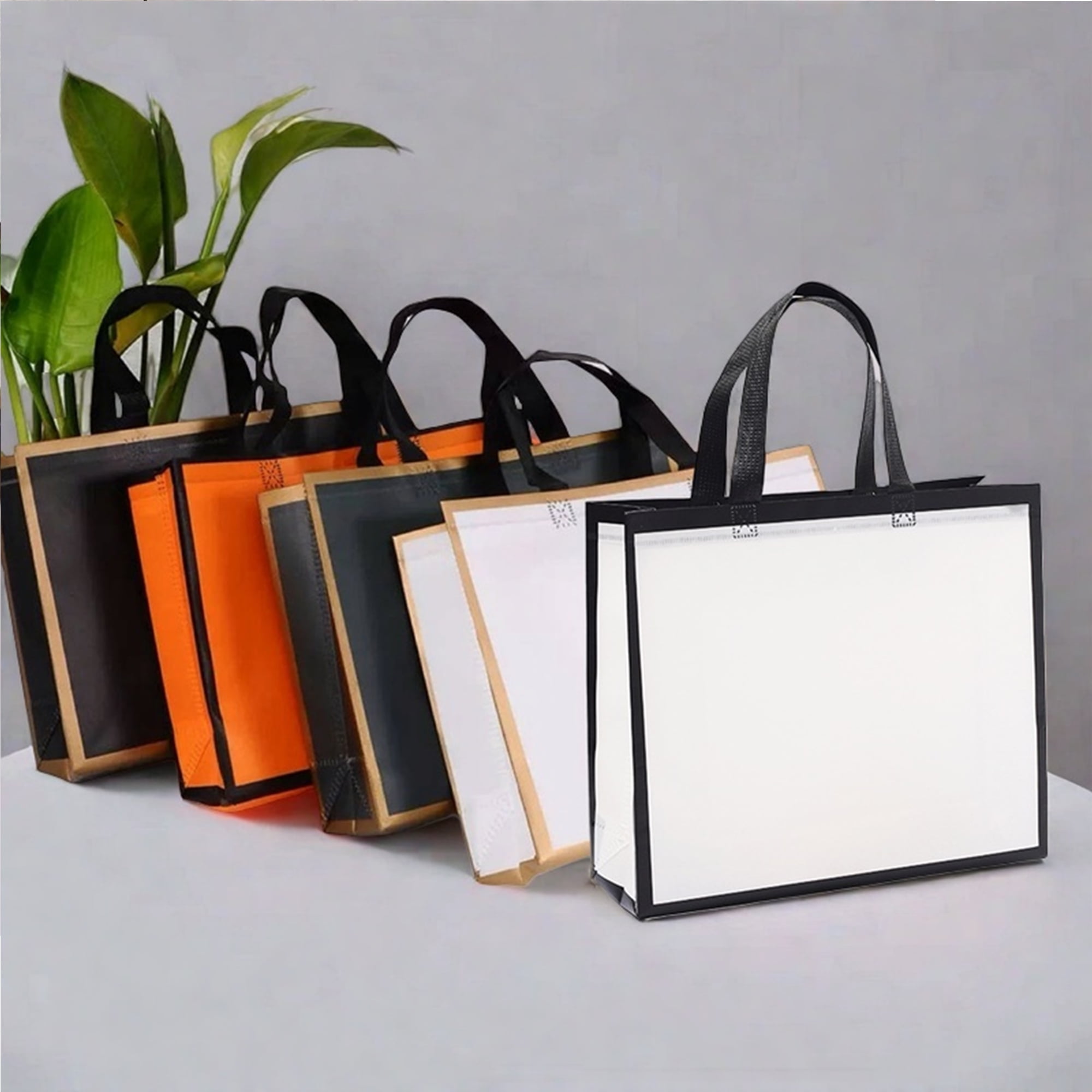 5 - Color multicolored set of foldable non - woven packaging bags ...