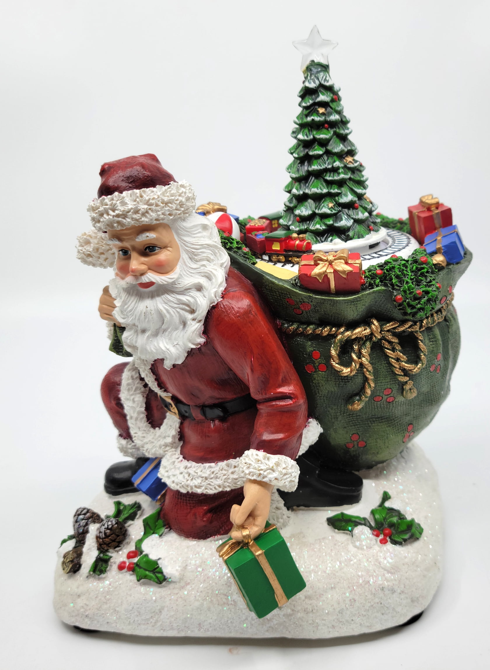 7.25 inch LED Kneeling Santa Figurine with Toy Sack and Rotating Train ...