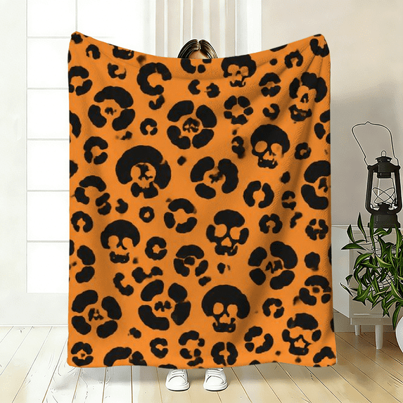 A 2D flat flannel blanket with a skull leopard print pattern, warm ...
